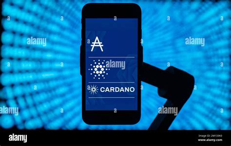 In This Photo Illustration The Logo Of Cardano Ada Is Seen Displayed On A Mobile Phone Screen
