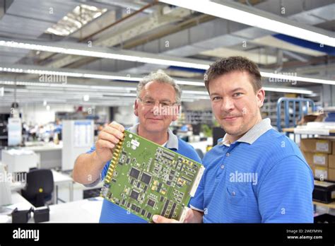 Working In A Microelectronics Manufacturing Factory Component Assembly And Soldering Group