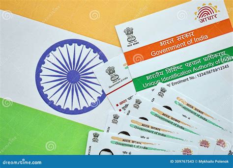 Indian Aadhaar Card From Unique Identification Authority Of India On Indian Flag Stock Image