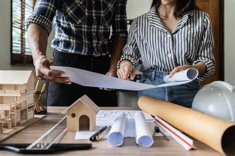 Premium Photo Architect Man Working With Blueprints For Architectural Plan Engineer Sketching