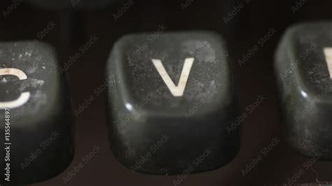 Macro Shot On The Letter V Key Typed On An Old Vintage Typewriter