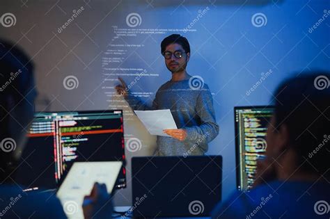 Asian And Indian Developer Team Brainstorming And Presentation About Ai Coding Project At Night