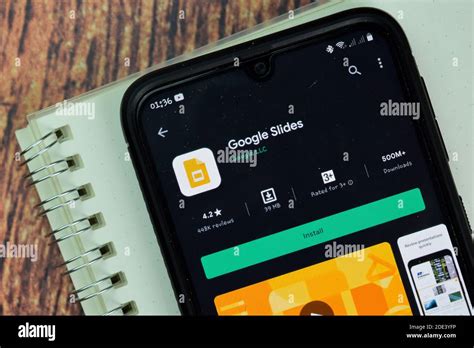 Google Slides Dev App With Magnifying On Smartphone Screen Google
