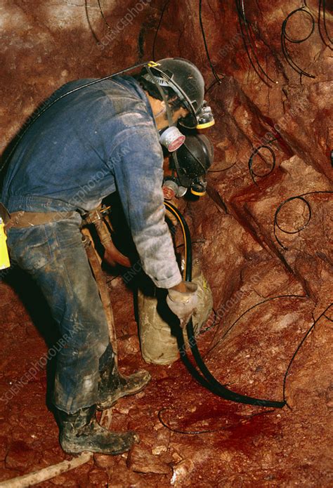 Worker Laying Explosives In Uranium Mine Stock Image T Science Photo Library