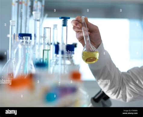 Property Released Model Released Scientist Holding A Chemical Formula