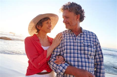 Its Been A Perfect Day A Mature Couple Enjoying A Late Afternoon Walk