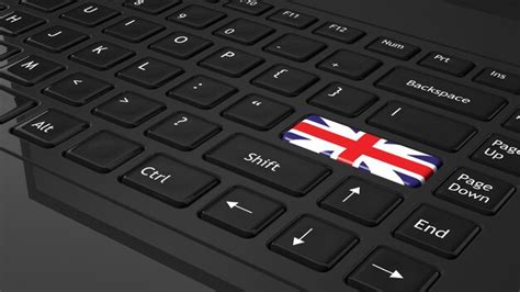 Premium Photo Black Keyboard With United Kingdom Flag On Enter