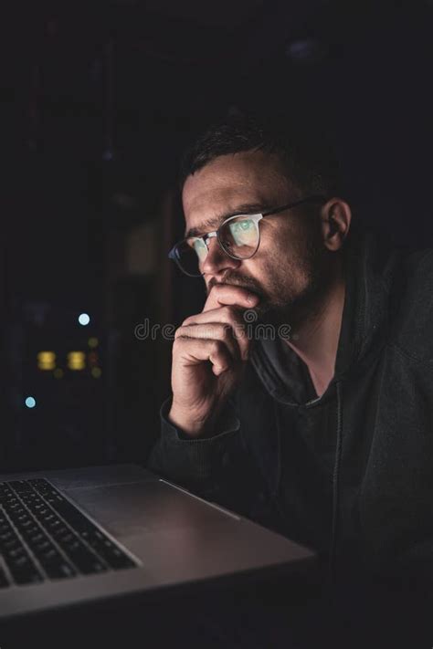A Man With Glasses Works At A Computer Late At Night Stock Photo Image Of Night Dark