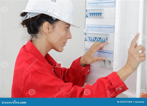 Female Electrician Checking Fuse Box Stock Image Image Of Electrician Conduit