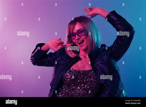 Happy Beautiful Blonde Lady In Leather Jacket Sparkly Dress Trendy