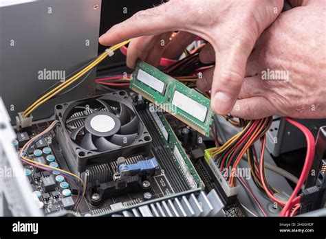 Hands Installing Ram Memory Stock Photo Alamy
