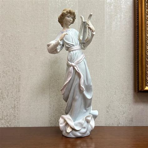 Фарфоровая статуэтка Lladro «ангел с лирой — цена 7000 грн в каталоге Статуэтки Купить товары