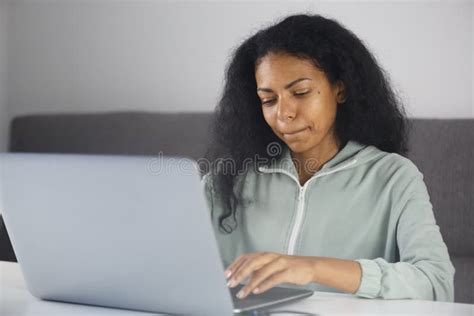Focused Bipoc Woman Works On Computer At Home Stock Image Image Of Freelance Focused 267743673