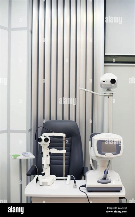 Vertical Background Image Of Modern Optometric Equipment In