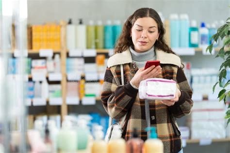 Checking Expiration Date Of Feminine Pads Female Shopper Scans Qr