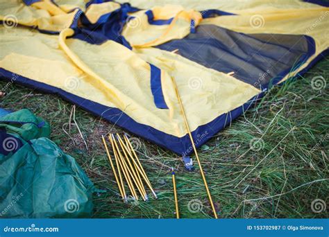 The Process Of Assembly And Installation Of A Tourist Tent Stock Image