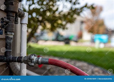 Winterizing A Residential Irrigation System By Using A Compressor And