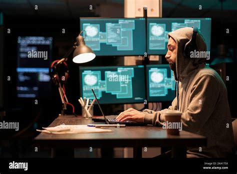 Male Criminal Trying To Break Database Server Using Virus To Code