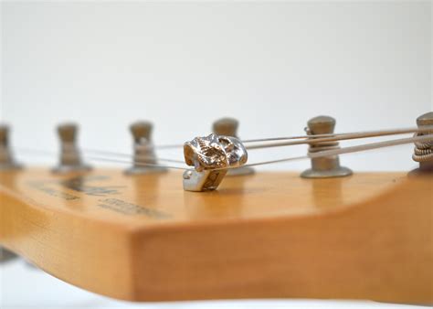 guitar string trees handcrafted by silver luthier