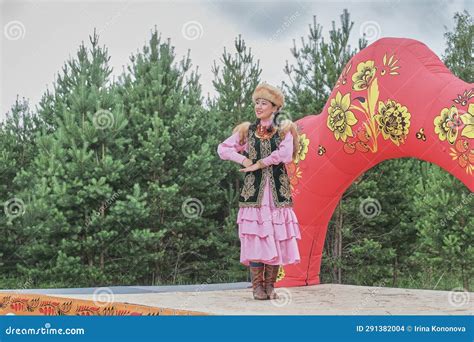 Portrait Of Happy Asian Girl In Traditional Festive Bashkir Clothes