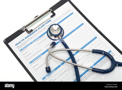 Medical And Health Insurance Claim Form With Stethoscope On Clipboard