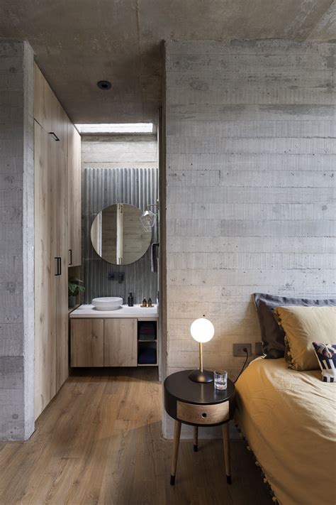 Living Space With Exposed Concrete Walls In A Modern Residence Subachoque Western Savanna