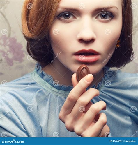 Glamorous Red Haired Ginger Girl In Blue Dress Eating Candy Stock Image Image Of Dessert