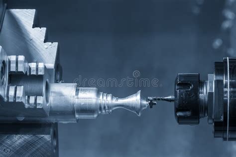 The Cnc Lathe Machine Milling The Metal Shaft Parts By Milling Spindle