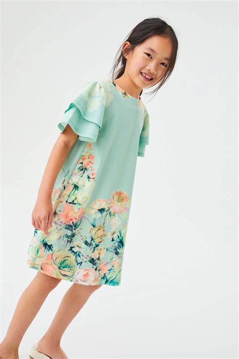 پیراهن پلیسه دخترانه سفید گل دار‎‎ لی لی نی کیدز