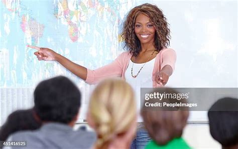 Woman Pointing Map Photos And Premium High Res Pictures Getty Images