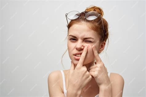 Premium Photo Woman With A Pimple On The Face Hygiene Treatment