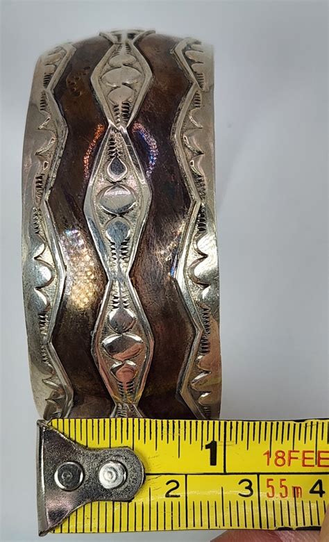 Douglas Etsitty Navajo Sterling Silver And Copper Stamp Gem