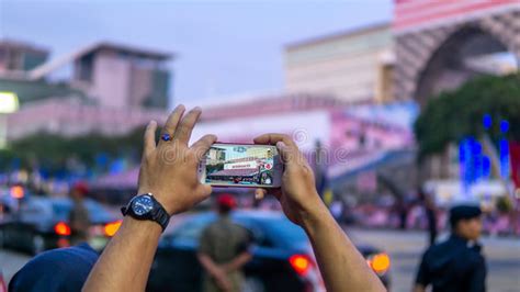 Unidentified Man Taking A Picture Using Smartphone Camera Stock Image