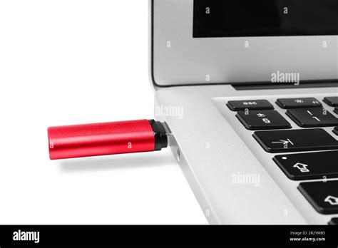 Usb Flash Drive Attached Into Laptop On White Background Stock Photo Alamy