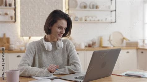 Female Babe Taking Notes During Video Lesson On Laptop Stock Video Adobe Stock