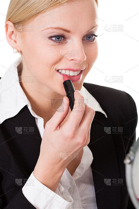 迷人的女商人涂口红