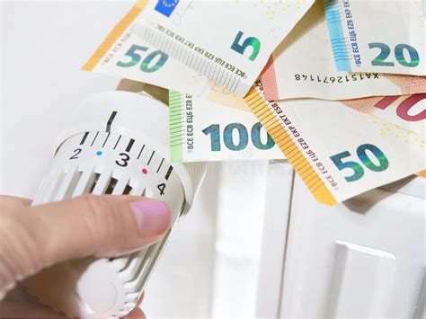 Womanand X27 S Hand Sets Thermostat Of Heating System To Low Temperature Radiator Battery With