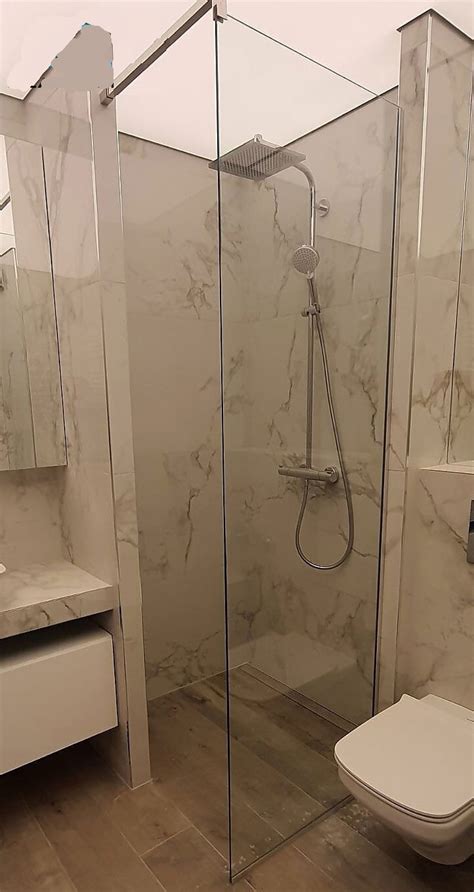 Стационарен параван прозрачно закалено стъкло 6мм Размер 70 200см обков от масивен месинг с