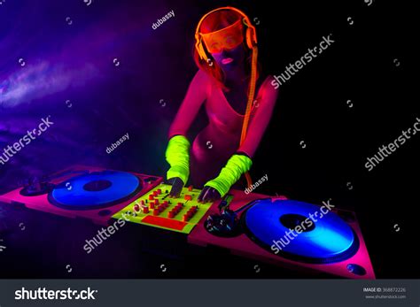 Sexy Female Dj Mixes Club Uv Stock Photo Shutterstock