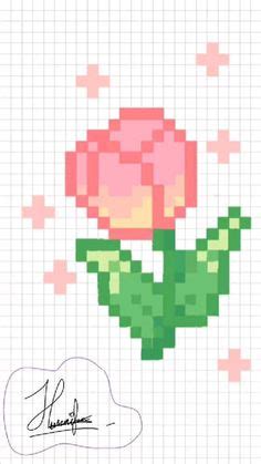 A Pink Flower With Green Leaves Is Shown On A Piece Of Paper That Has