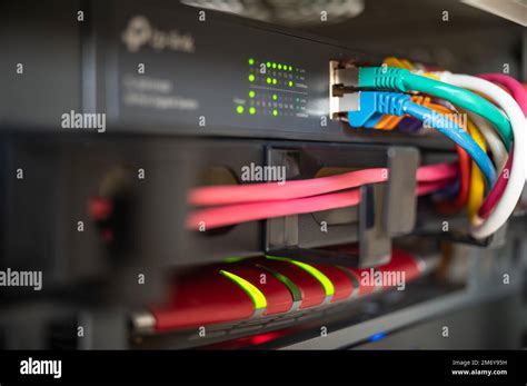 Router And Switch With Colorful LAN Cables In A Network Cabinet Of A Data Center Stock Photo Alamy