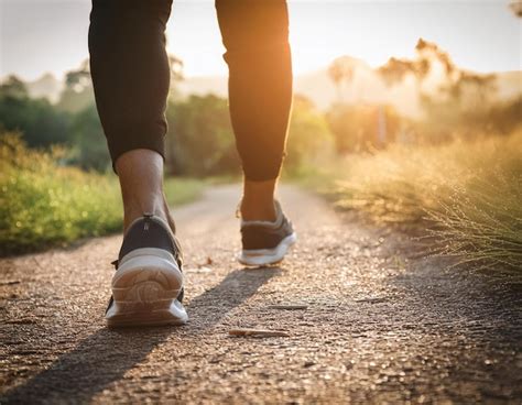 Closeup Of Feet Walking On A Path Premium Ai Generated Image