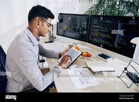 Software Developer Checking Mindmap Stock Photo Alamy