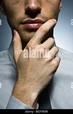 Man With Hand Under Chin Portrait Stock Photo Alamy