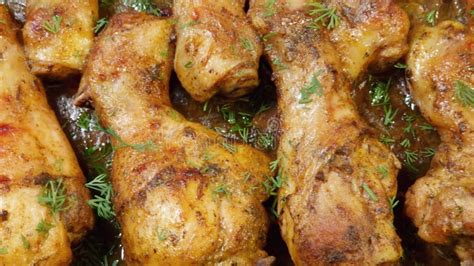 Baked Chicken Legs On Metal Oven Tray On Rustic Table Stock Footage