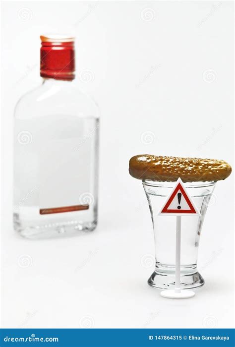 A Shot Of Vodka With Cucumber And A Warning Exclamation Sign Stock Image Image Of Disease