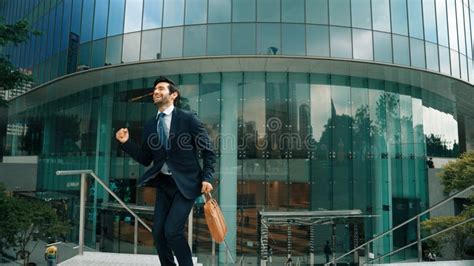 Dancing Business Man Walking And Hold Bag While Dancing At Park Exultant Stock Photo Image