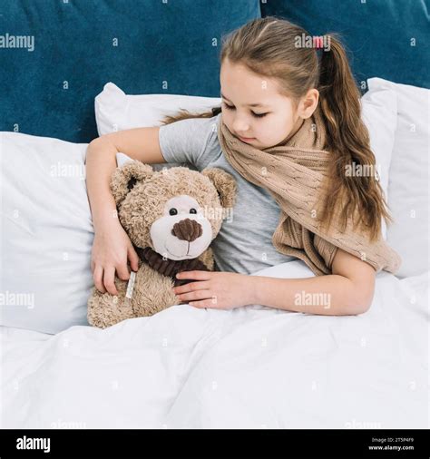Girl Having Fever Holding Thermometer Teddy Bear S Hand Checking