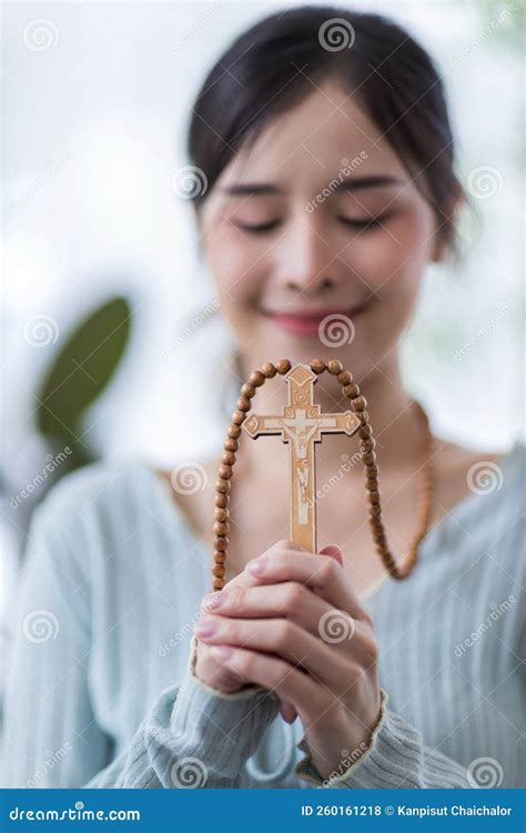 Woman In Religion Concept Hands Praying To The God While Holding A