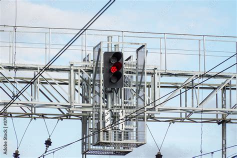 Railway Traffic Light On A Metal Structure Shows A Red Light Traffic